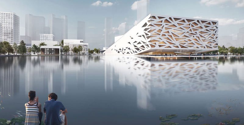Henning Larsen designs an opera house that slopes above a lake in China ...